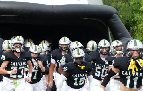 Calvary quarterbacks take turns lighting up Jerry Barker Stadium ...